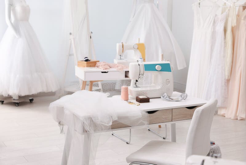 Dressmaking Workshop Interior with Wedding Dresses and Equipment Stock ...