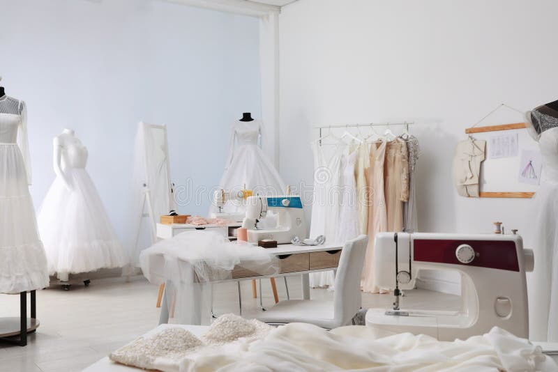 Dressmaking Workshop Interior with Wedding Dresses and Equipment Stock ...