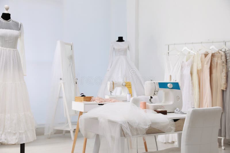Dressmaking Workshop Interior with Wedding Dresses and Equipment Stock ...