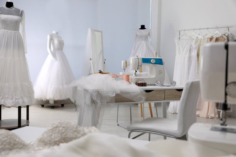 Dressmaking Workshop Interior with Wedding Dresses and Equipment Stock ...