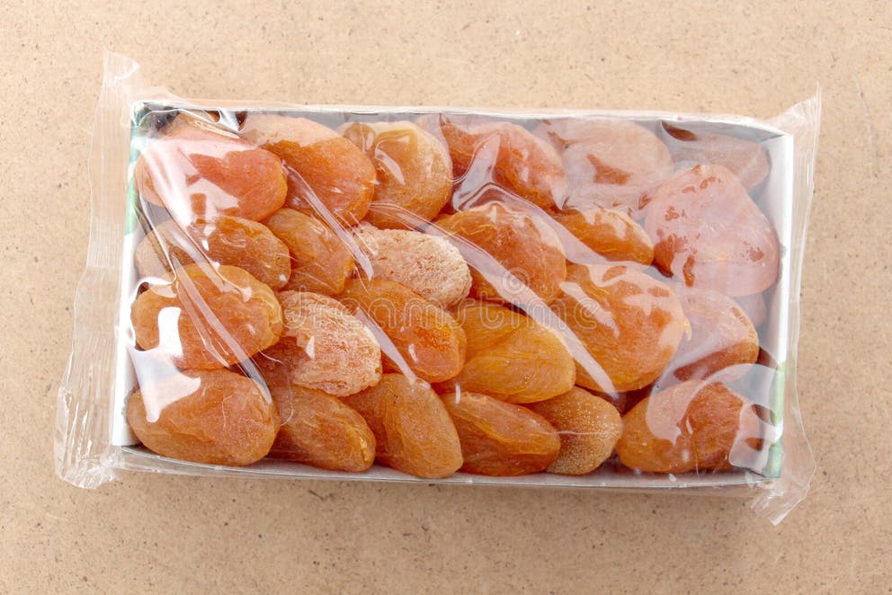 Dried Apricots on Plastic Packaging Stock Photo - Image of market ...