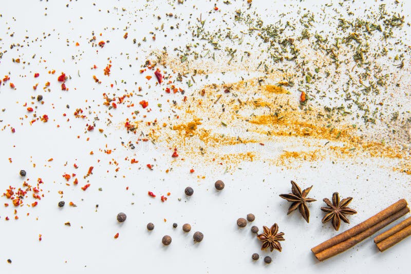 Dried Aromatic Spices and Herbs Scattered on Grey Stock Photo - Image ...
