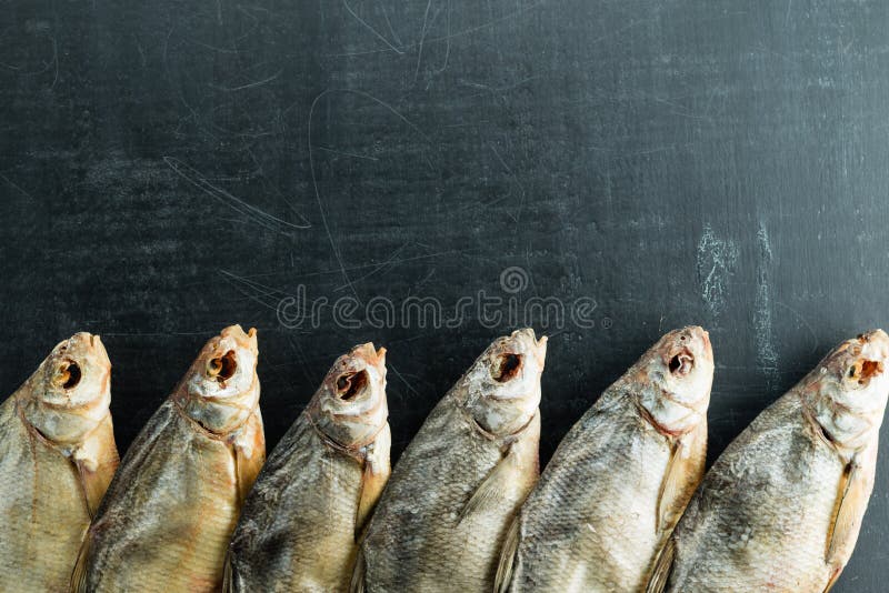Dried Bream on a Dark Table Stock Image - Image of black, meal: 120659623