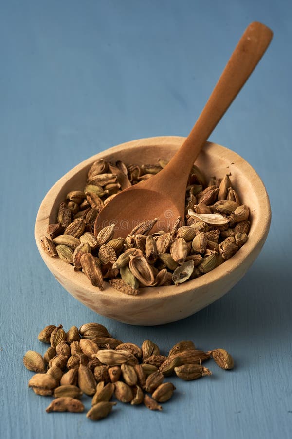 Dried cardamom seeds stock photo. Image of spoon, food - 209136736