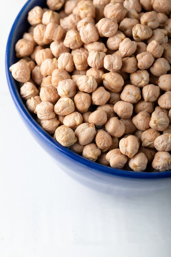 Dried Chickpeas in Blue Ceramic Bowl on White Background Stock Photo ...