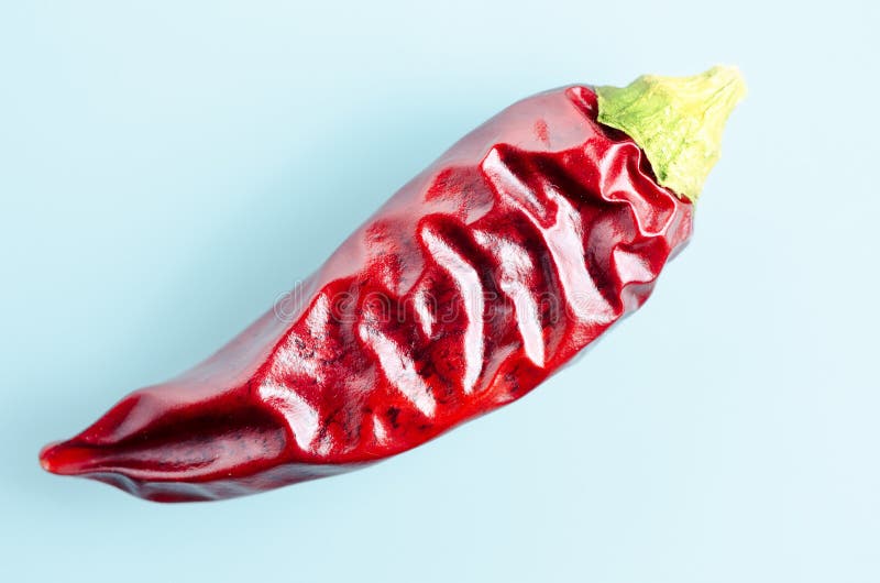 Dried Chili Peppers on a Light Blue Background Stock Image - Image of ...