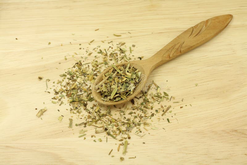 Dried Chopped Herbs in a Wooden Spoon Stock Photo - Image of blend ...