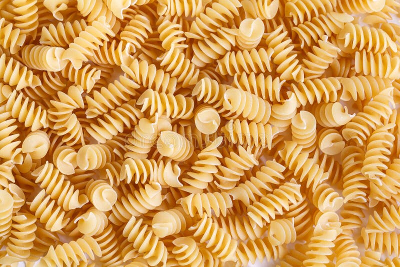 A Pasta Eliche Tricolori and a Wood Spoon. Stock Image - Image of helix ...