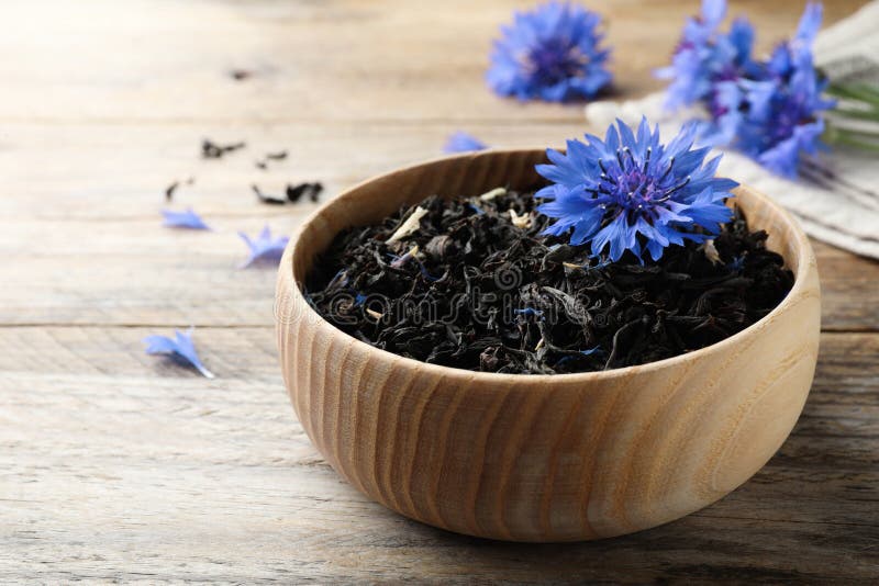 Dried Cornflower Tea and Fresh Flowers on Wooden Table Stock Photo ...
