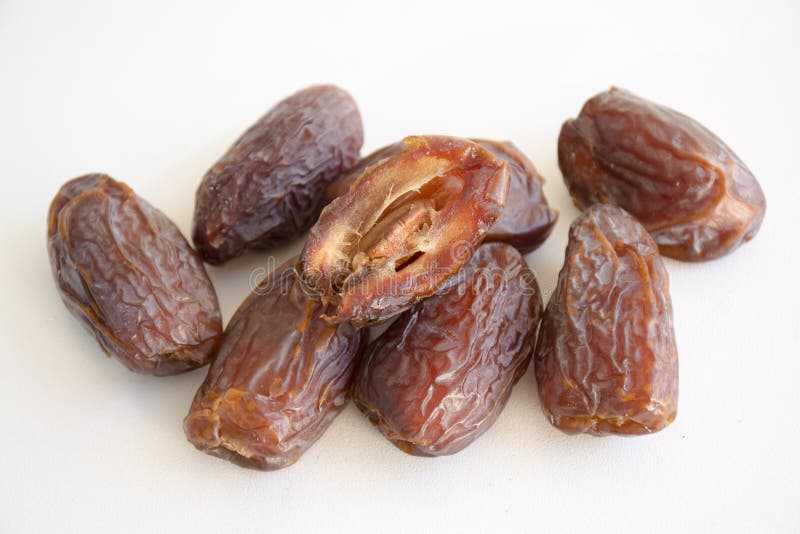 Dried Date Fruit Whole and Cross Section Stock Photo - Image of cross ...