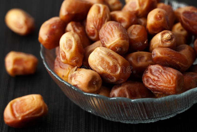 Dried Dates in a Glass Bowl. Low Key Stock Image - Image of date, bowl ...