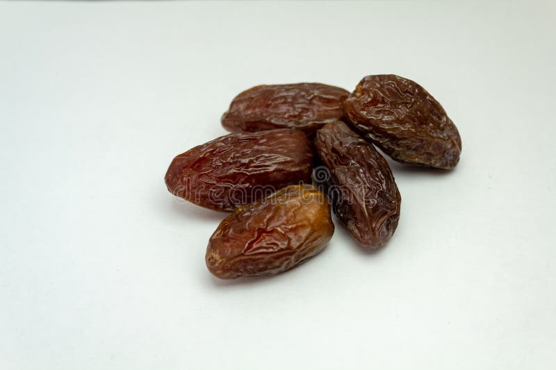Dates Isolated on White Background . Top View Stock Photo - Image of ...