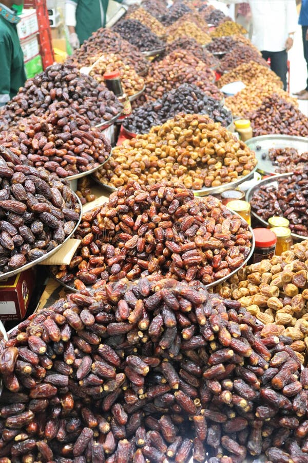 Dried dates at a market stock photo. Image of dates - 108689646