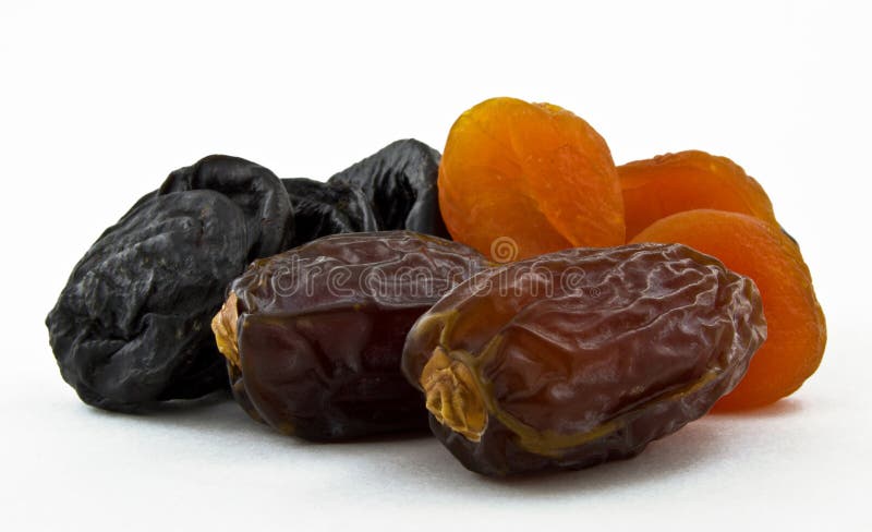 Dried Dates, Prunes and Apricots on White Background Stock Photo ...