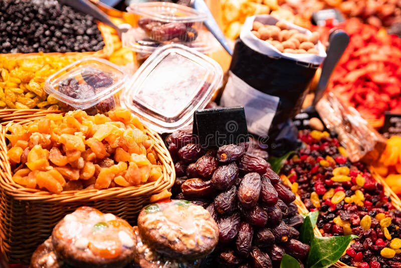 Dried dates and raisins stock image. Image of display - 147103635