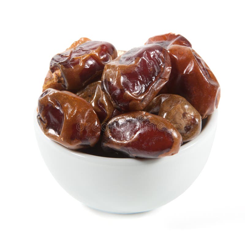 Dried dates in white cup stock photo. Image of isolated - 40775402