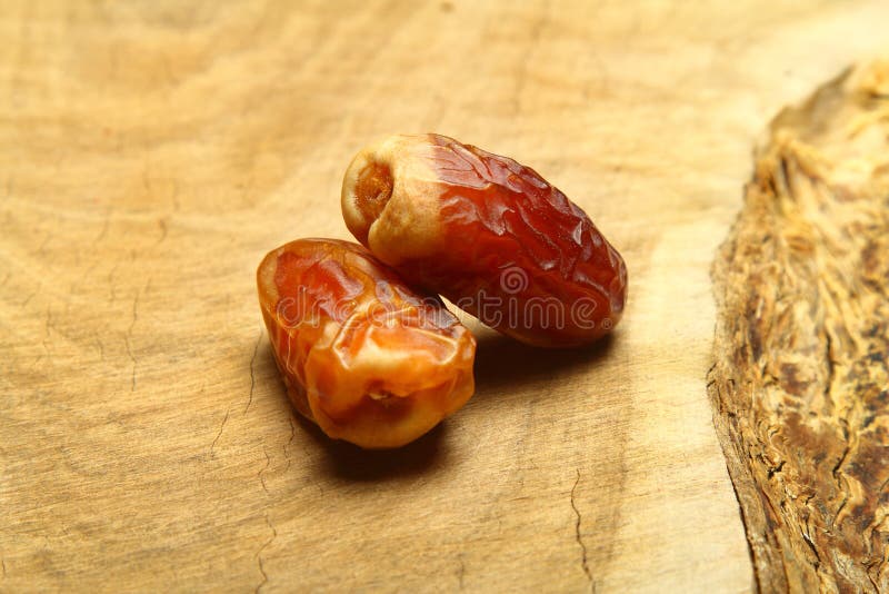 Composition of Dried Dates in Ramadan Dish on Wooden Table. Stock Image ...