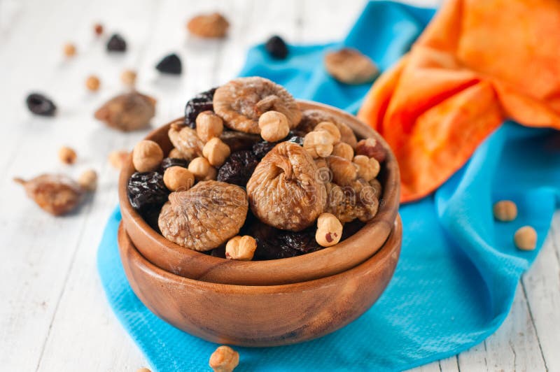 Dried figs, nuts and plums stock image. Image of organic - 30200983