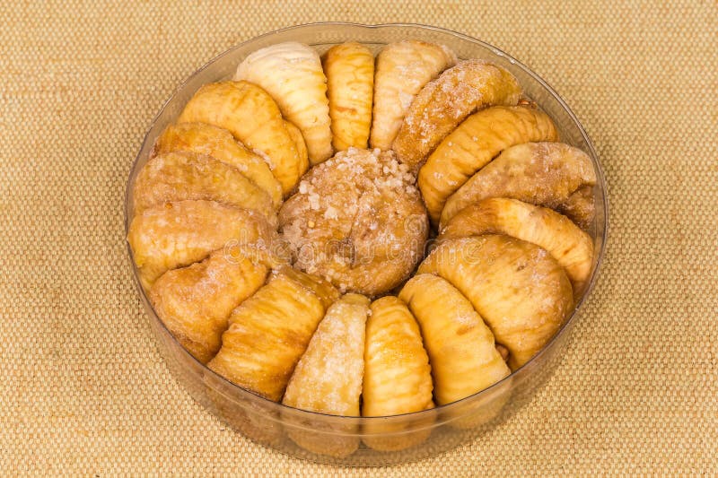 Dried Figs in Open Round Plastic Packaging on Textile Napkin Stock ...