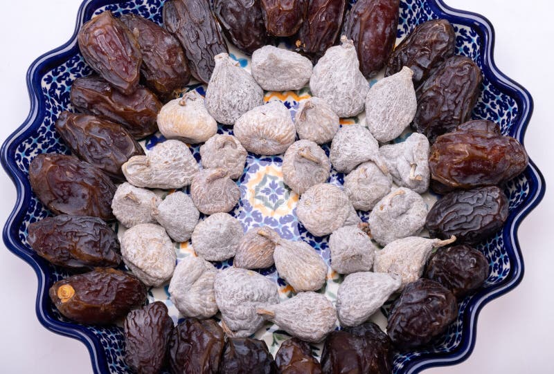 Dried Figs Sprinkled with Rice Flour and Medjoul Jumbo Dates. Stock ...