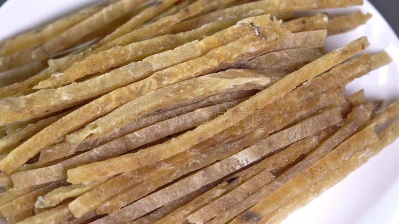 Dried Fish Fillet Cut into Strips Rotates in a Circle Stock Video ...
