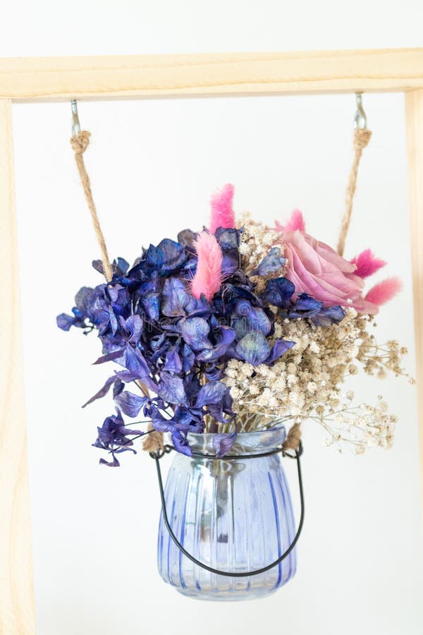 Dried Flowers in Glass Container Inside a Frame Stock Image - Image of ...