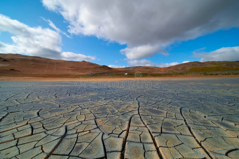 Dried Land in the Desert. Cracked Soil Crust Stock Photo - Image of ...
