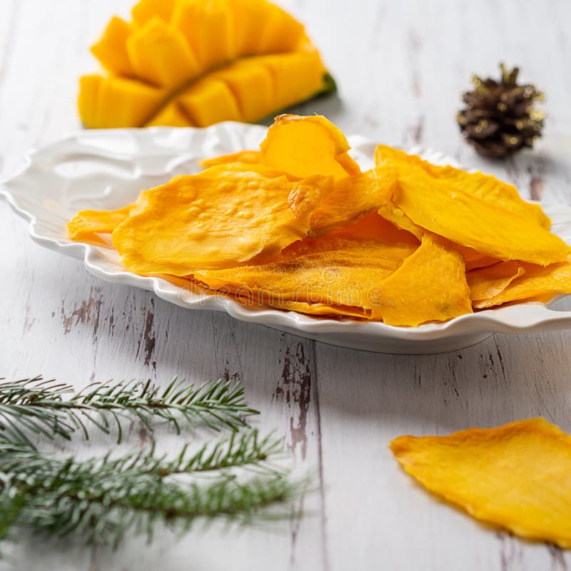 Dried Mango Lay on the White Plate Stock Photo - Image of orange, slice ...