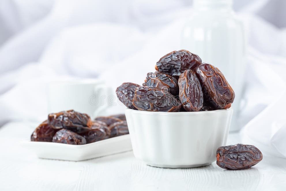Dried Medjool Dates on a White Table Stock Image - Image of exotic ...