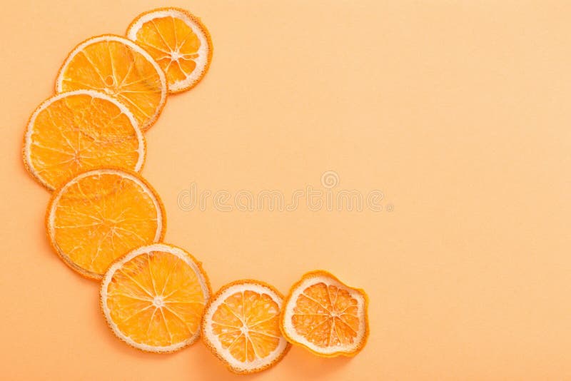 Dried Oranges on Color Paper Background Stock Photo - Image of ...