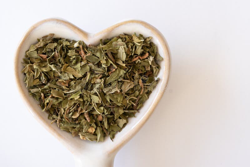 Dried Peppermint Flakes in a Heart Shape Stock Photo - Image of ...