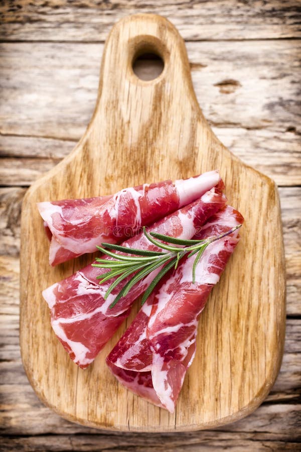 Dried Pig Meat Slices. Delicatess. Stock Photo - Image of studio ...