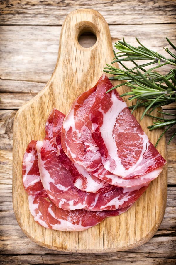 Dried Pig Meat Slices. Delicatess Stock Photo - Image of slices, studio ...