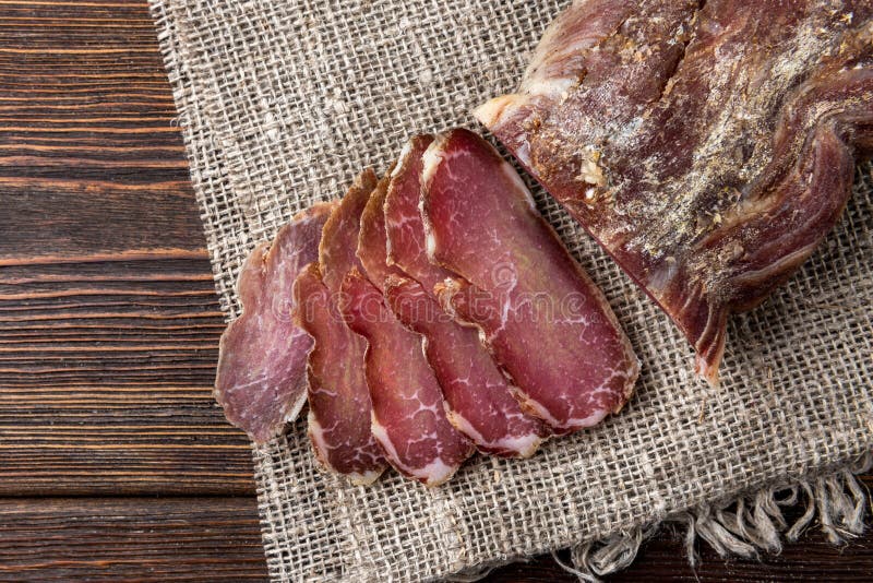 Dried Pork Meat on Dark Wooden Background Stock Photo - Image of roast ...