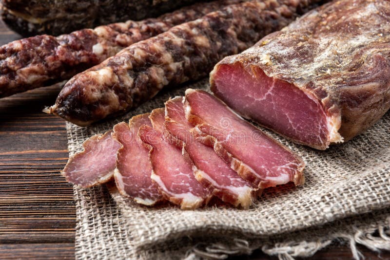 Dried Pork Meat on Dark Wooden Background Stock Photo - Image of ...