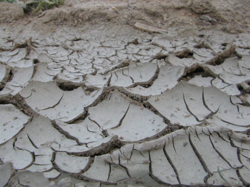 Dried Up Puddle Left with Stones Along the Pathway Stock Image - Image ...