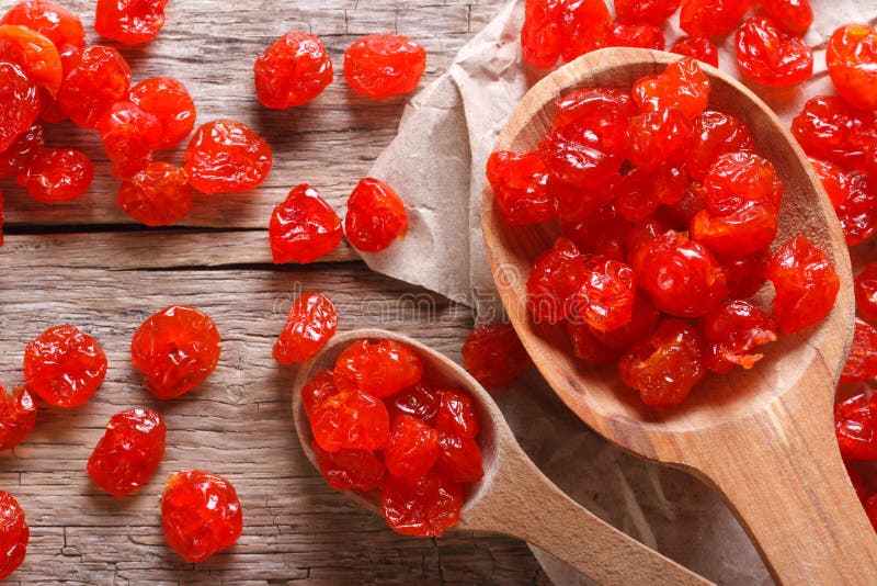 Dried Red Cherries in a Wooden Spoon Macro. Top View Stock Image ...