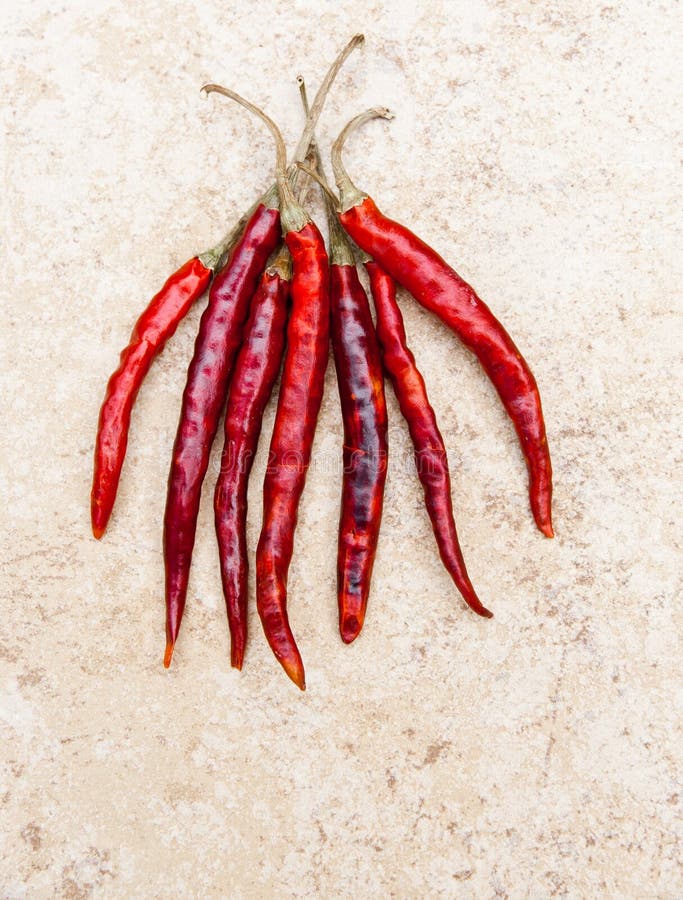 Dried Red Chili Peppers and Spices on Rustic, Dark Wood Cutting Stock ...