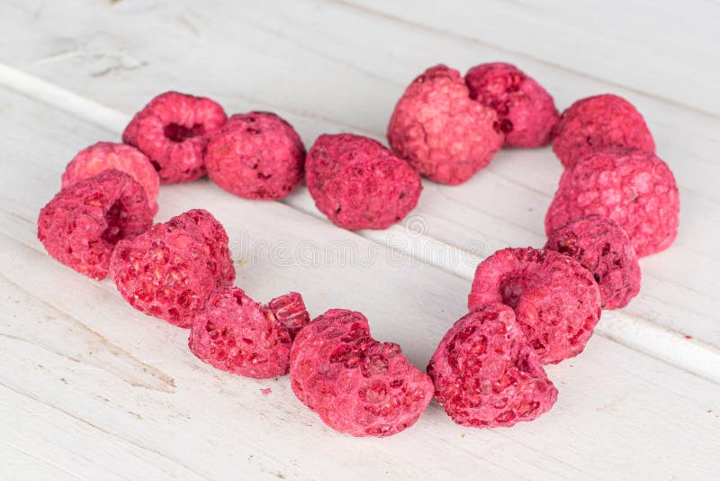 Dried Red Raspberry on Grey Wood Stock Image - Image of pile, intense ...