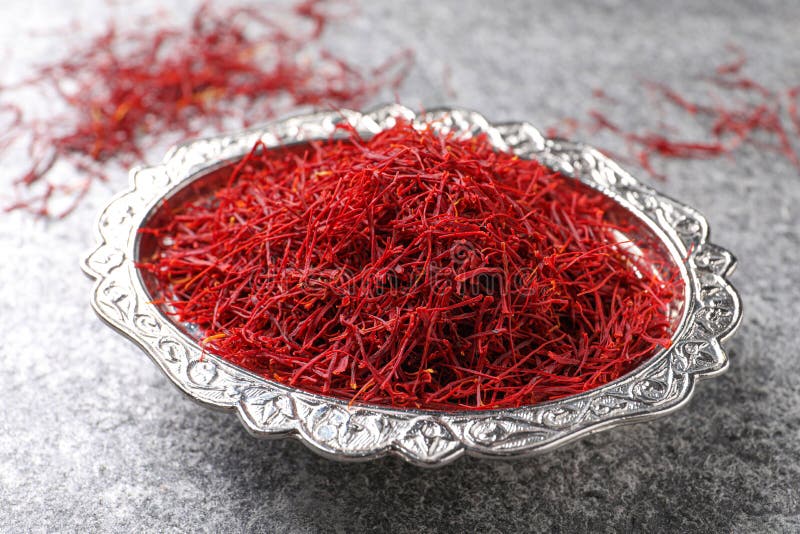 Dried Saffron on Blue Wooden Table, Closeup Stock Photo - Image of ...