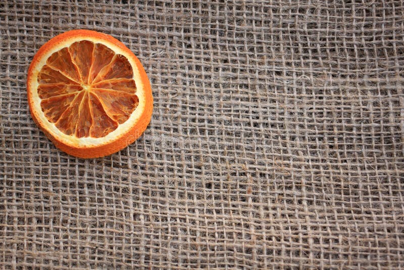 Dried Slice of Orange on Jute Background Stock Image - Image of dried ...