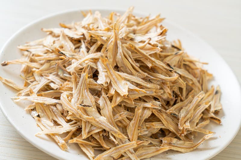 Dried small crispy fish stock image. Image of dining - 213536185