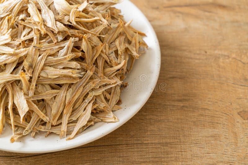 Dried small crispy fish stock photo. Image of healthy - 223676410