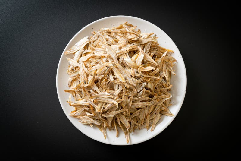 Dried small crispy fish stock photo. Image of meal, cooking - 227783850