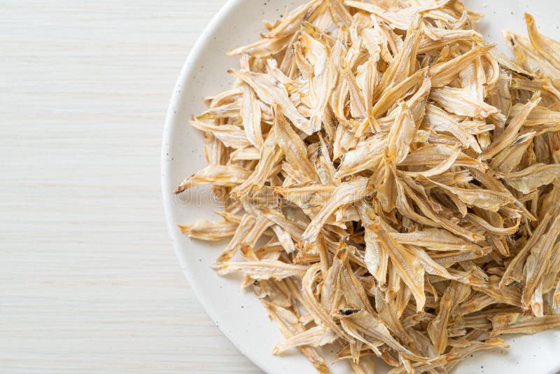 Dried small crispy fish stock image. Image of anchovies - 268346549