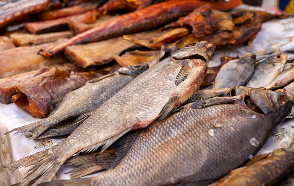 Smoked fish on the counter stock image. Image of salted - 372618569