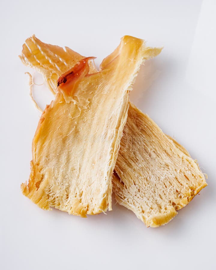 Dried Squid Meat on a White Acrylic Background Stock Image - Image of ...