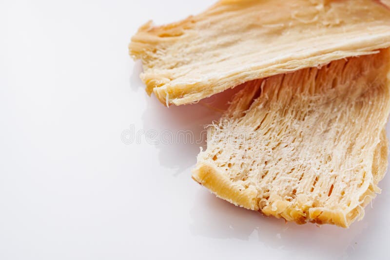 Dried Squid Meat on a White Acrylic Background Stock Photo - Image of ...