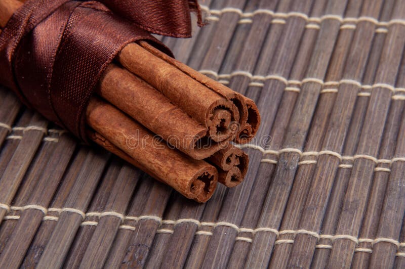 Dried Sticks of Cinnamon Natural Spices on Bamboo Mat Stock Photo ...