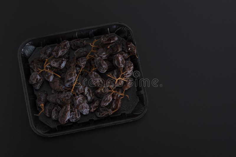 Dried Sultanas on Black Plastic Drying Sheet. Stock Image - Image of ...